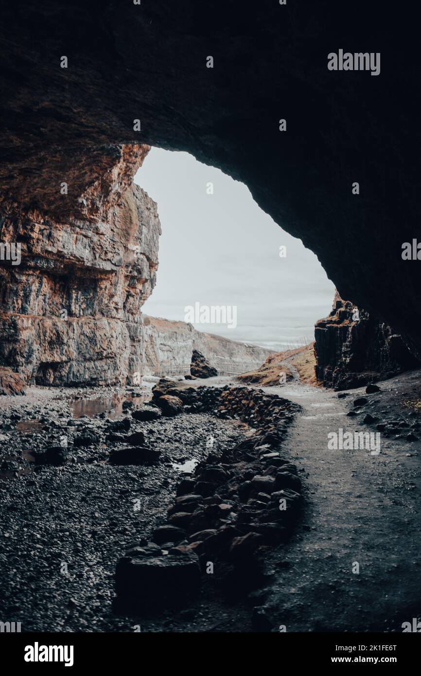 A scenic view of Smoo cave with combined sea cave and freshwater cave ...