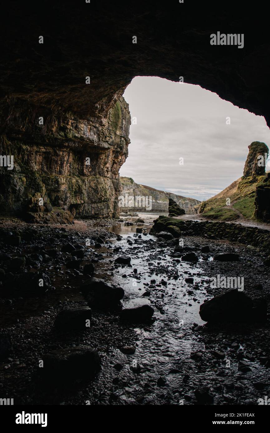 A scenic view of Smoo cave with combined sea cave and freshwater cave ...