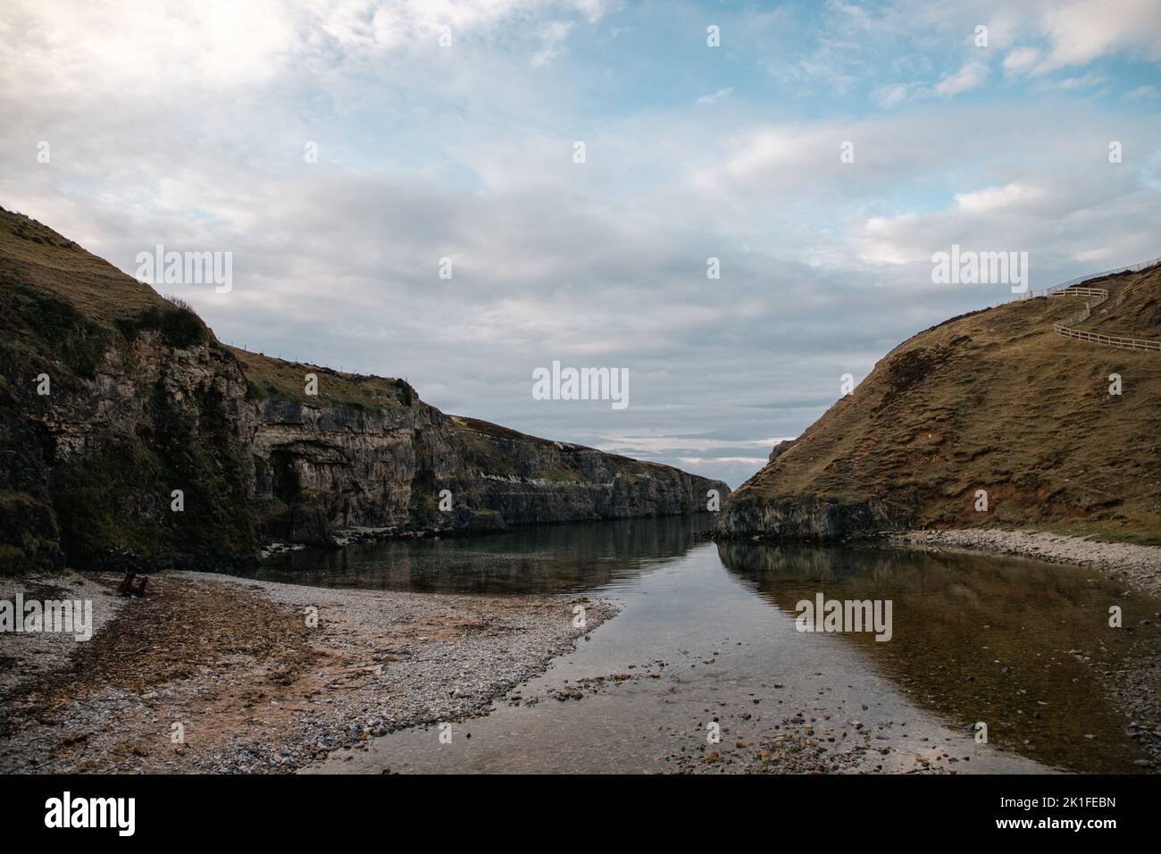 A scenic view of Smoo cave with combined sea cave and freshwater cave ...