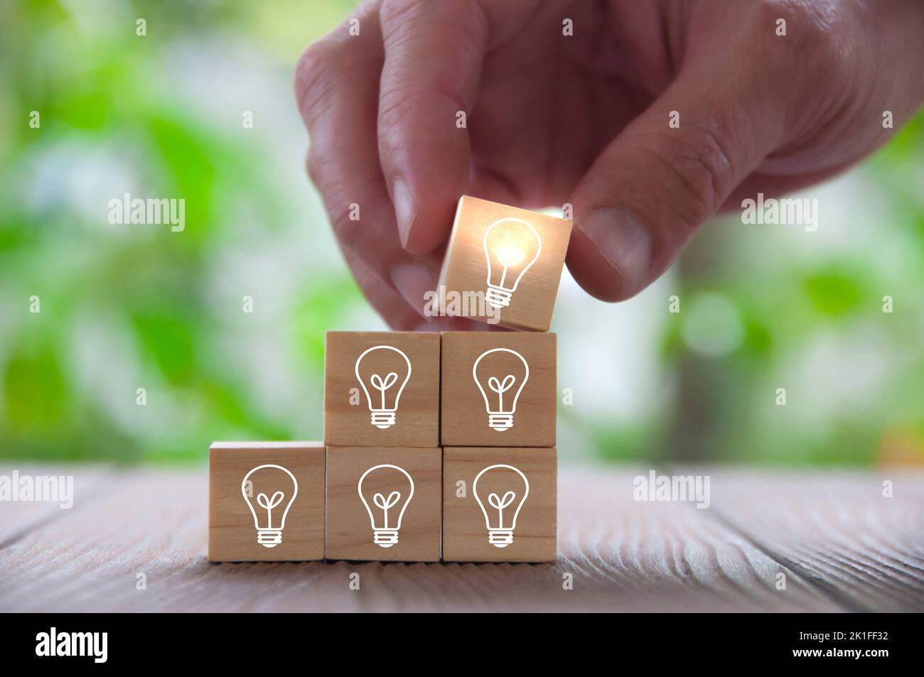 Light bulb representing think innovation hi-res stock photography and images - Alamy