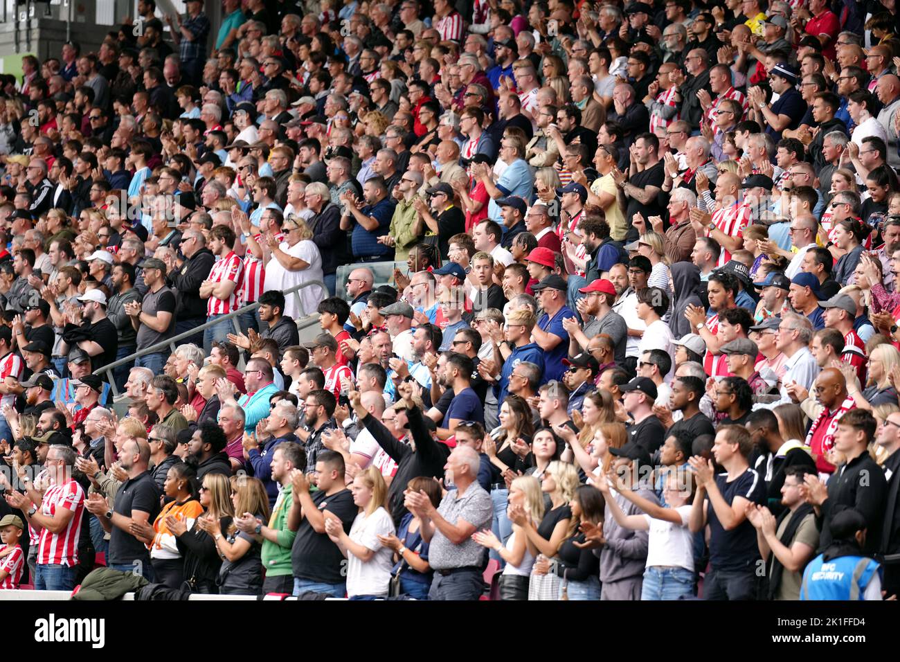 Brentford fans take part in a minutes applause for Queen Elizabeth II ...
