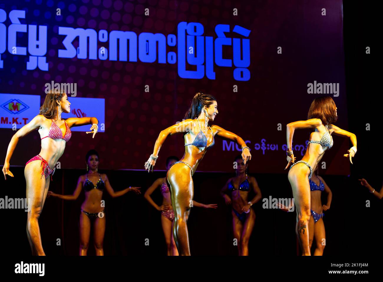 Yangon, Myanmar. 18th Sep, 2022. Female Bodybuilders pose during the Myanmar Bodybuilding and ...