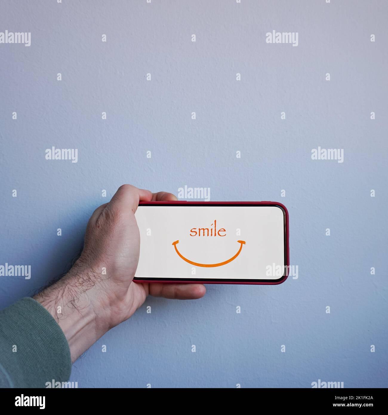 smile text on the smartphone, feeling and emotion Stock Photo - Alamy