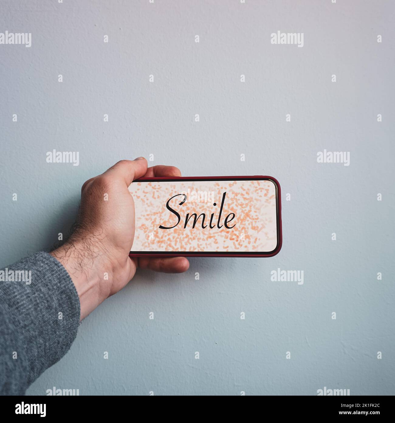 smile text on the smartphone, feeling and emotion Stock Photo - Alamy