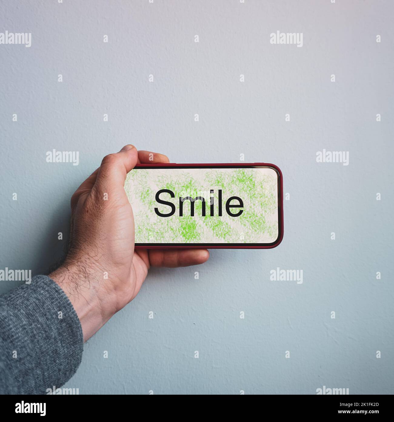 smile text on the smartphone, feeling and emotion Stock Photo - Alamy