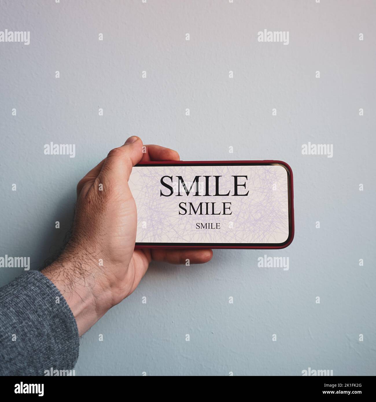 smile text on the smartphone, feeling and emotion Stock Photo - Alamy