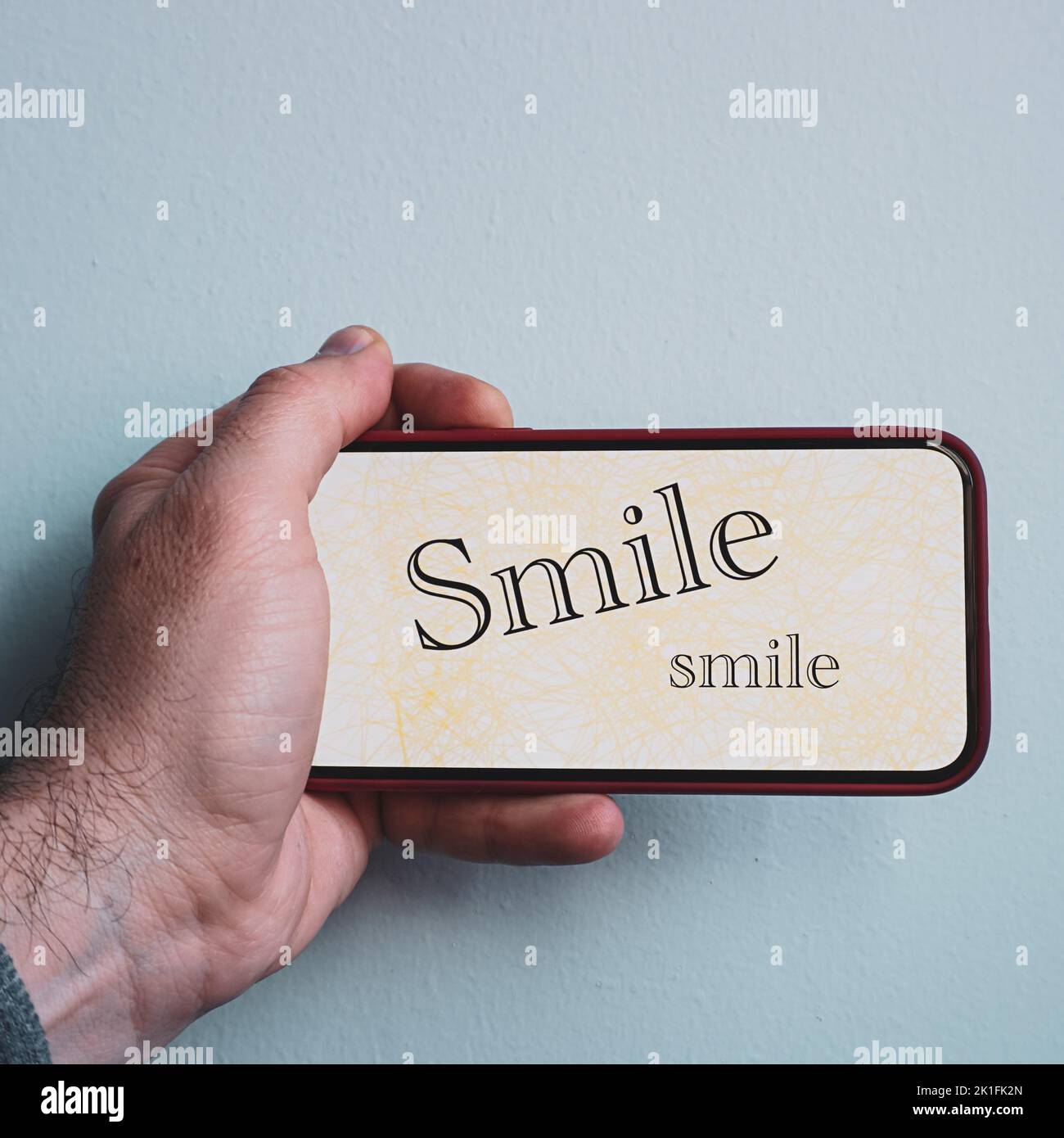 smile text on the smartphone, feeling and emotion Stock Photo - Alamy