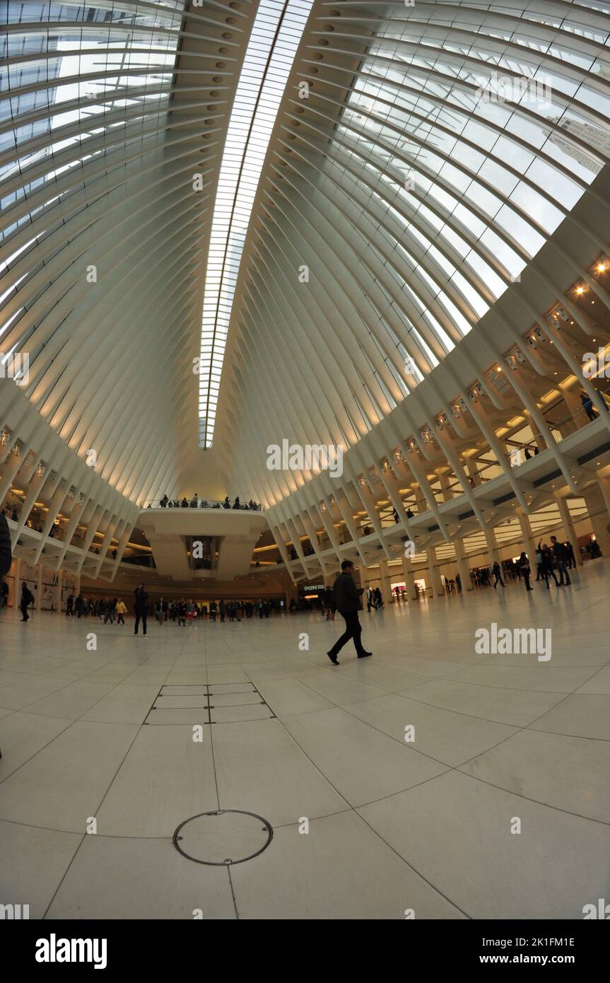 a vertical shot of people on the stairs of the Westfield World Trade ...