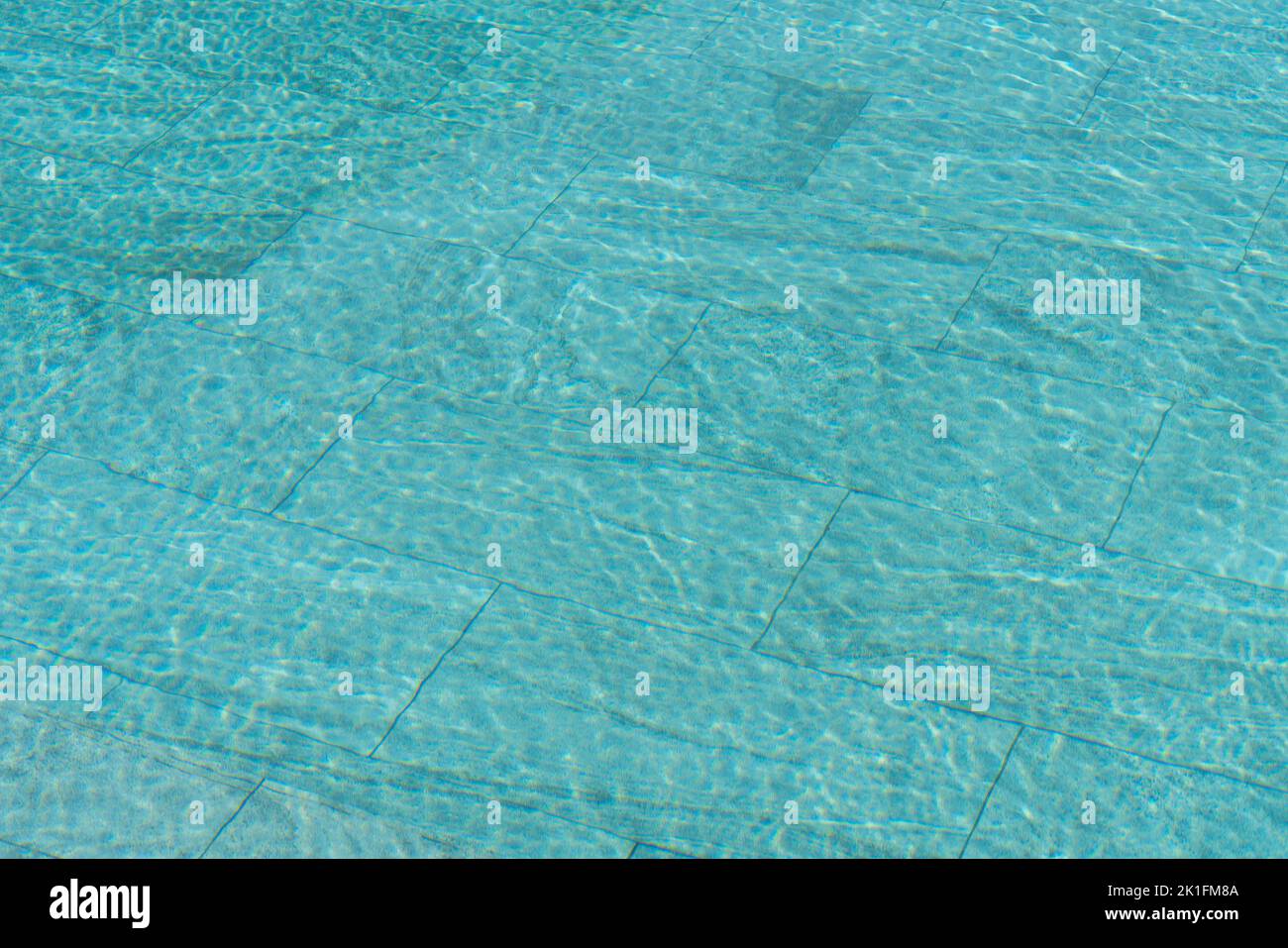 Swimming pool water background with caustic ripple. Aquatic surface ...
