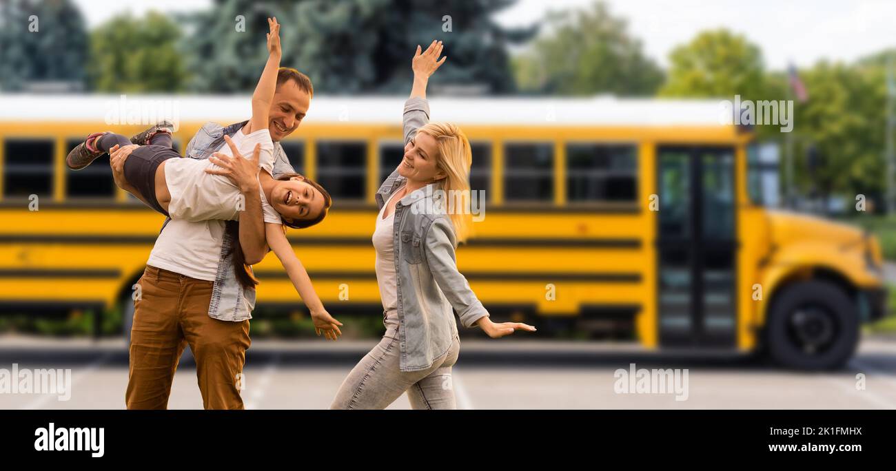 family together by the school bus Stock Photo - Alamy
