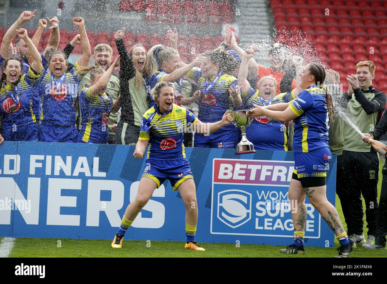 Warrington Wolves players celebrate winning the Shield Final following ...
