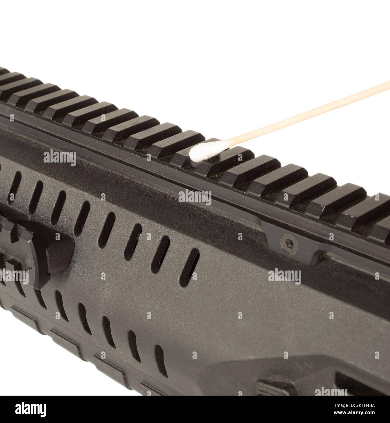 Rails on an assault rifle being cleaned isolated on white Stock Photo ...