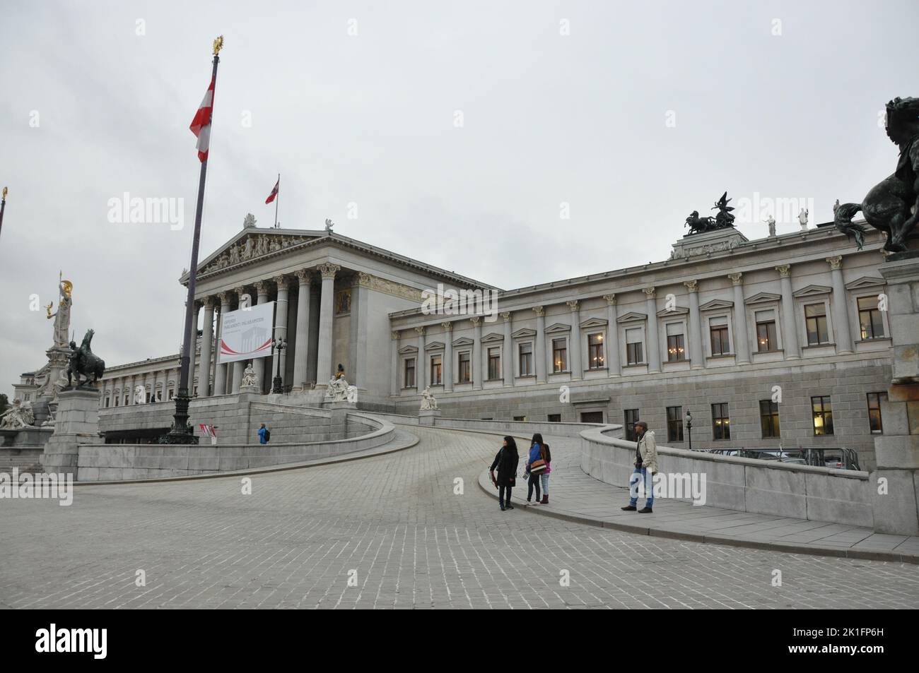 A greyscale shot of the Austrian Parliament building in Vienna in ...