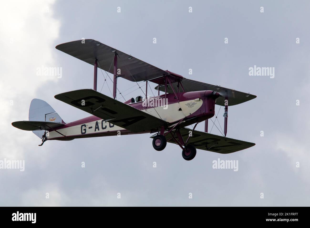 Tiger Moth from the Tiger 9 display team landing at dusk, after it's ...