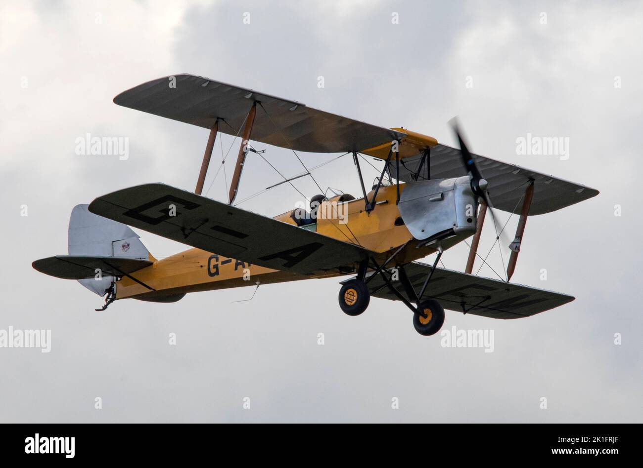 Tiger Moth from the Tiger 9 display team landing at dusk, after it's ...