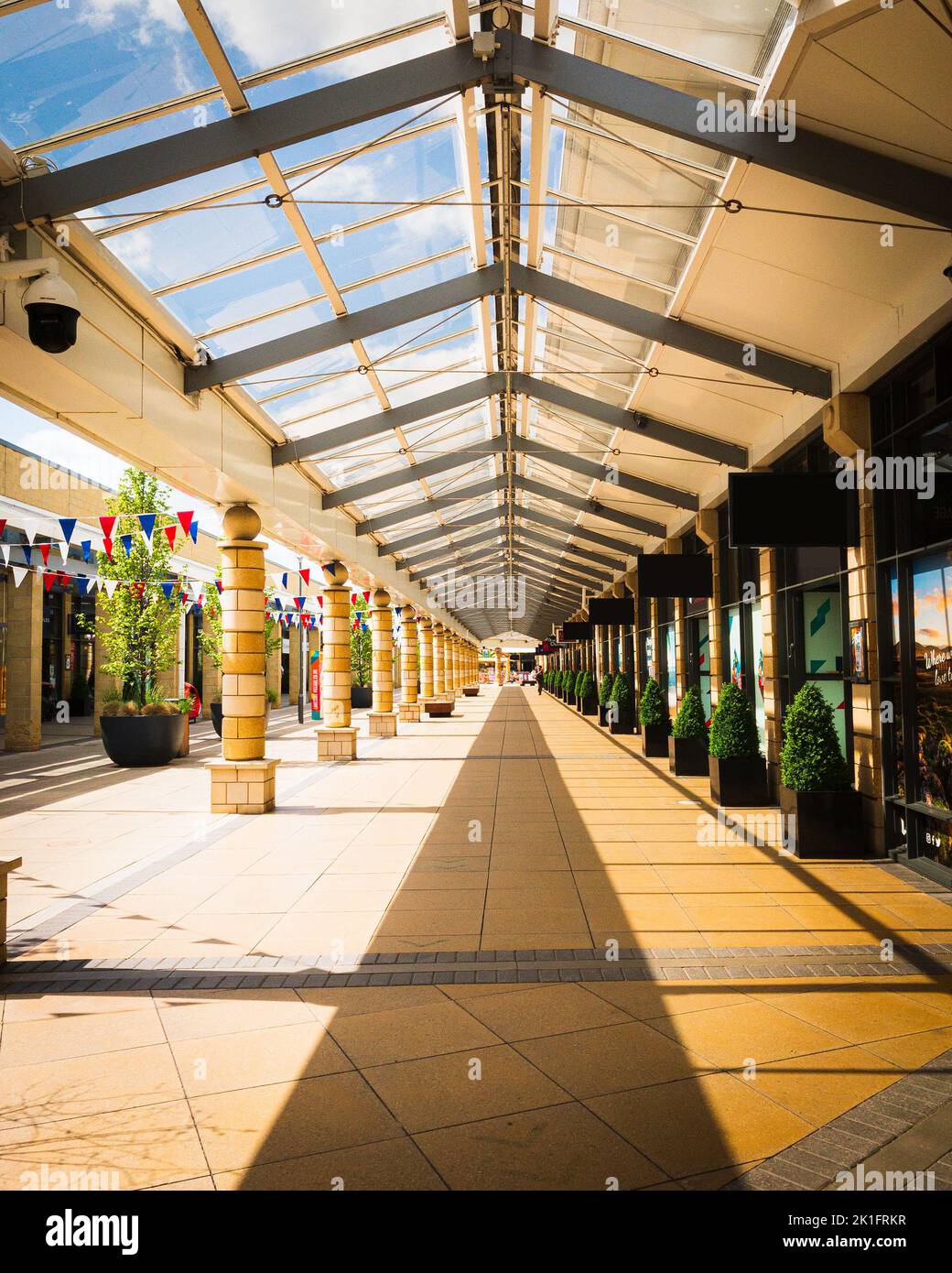 A vertical shot of an Outdoor shopping mall during daylight in ...