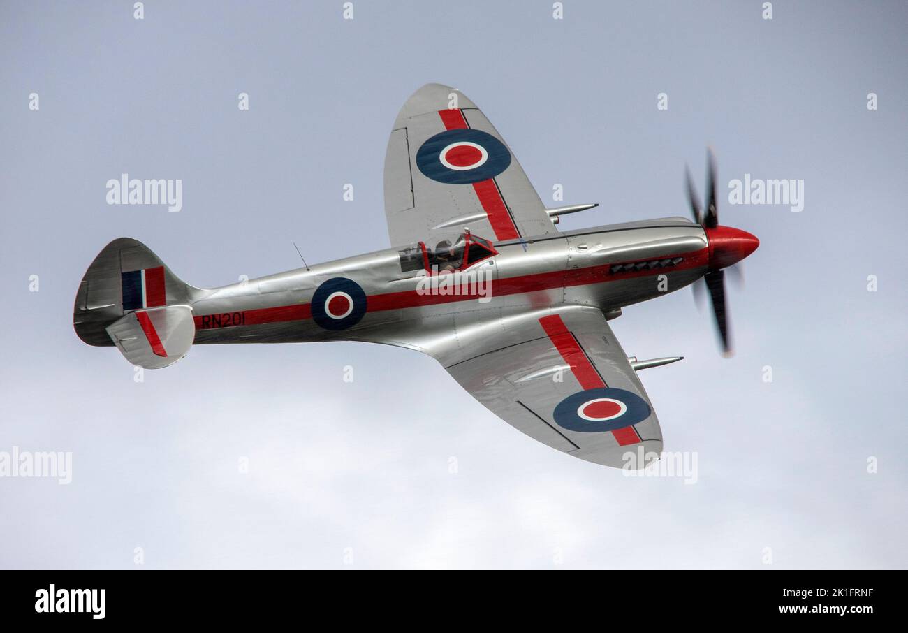 Supermarine Spitfire Mk.XIVe RN201 ( G-BSKP) flying through the rain ...