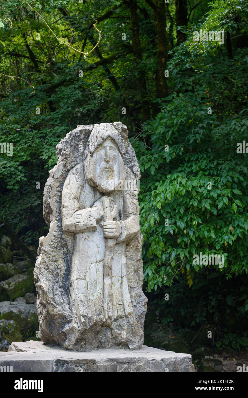 Stone sculpture among trees symbolises forest dwellers Stock Photo - Alamy