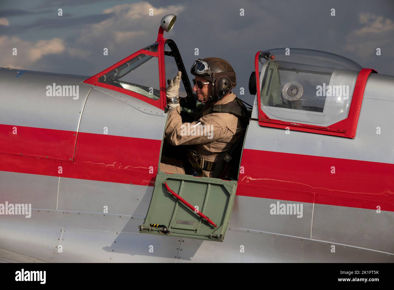 The pilot of Supermarine Spitfire Mk.XIVe RN201 ( G-BSKP) fwaving to ...