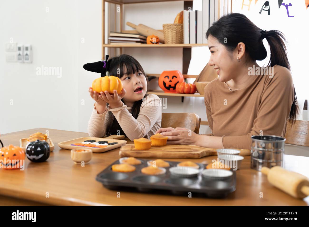 Mother And Her Daughter Having Fun At Home Happy Family Preparing For