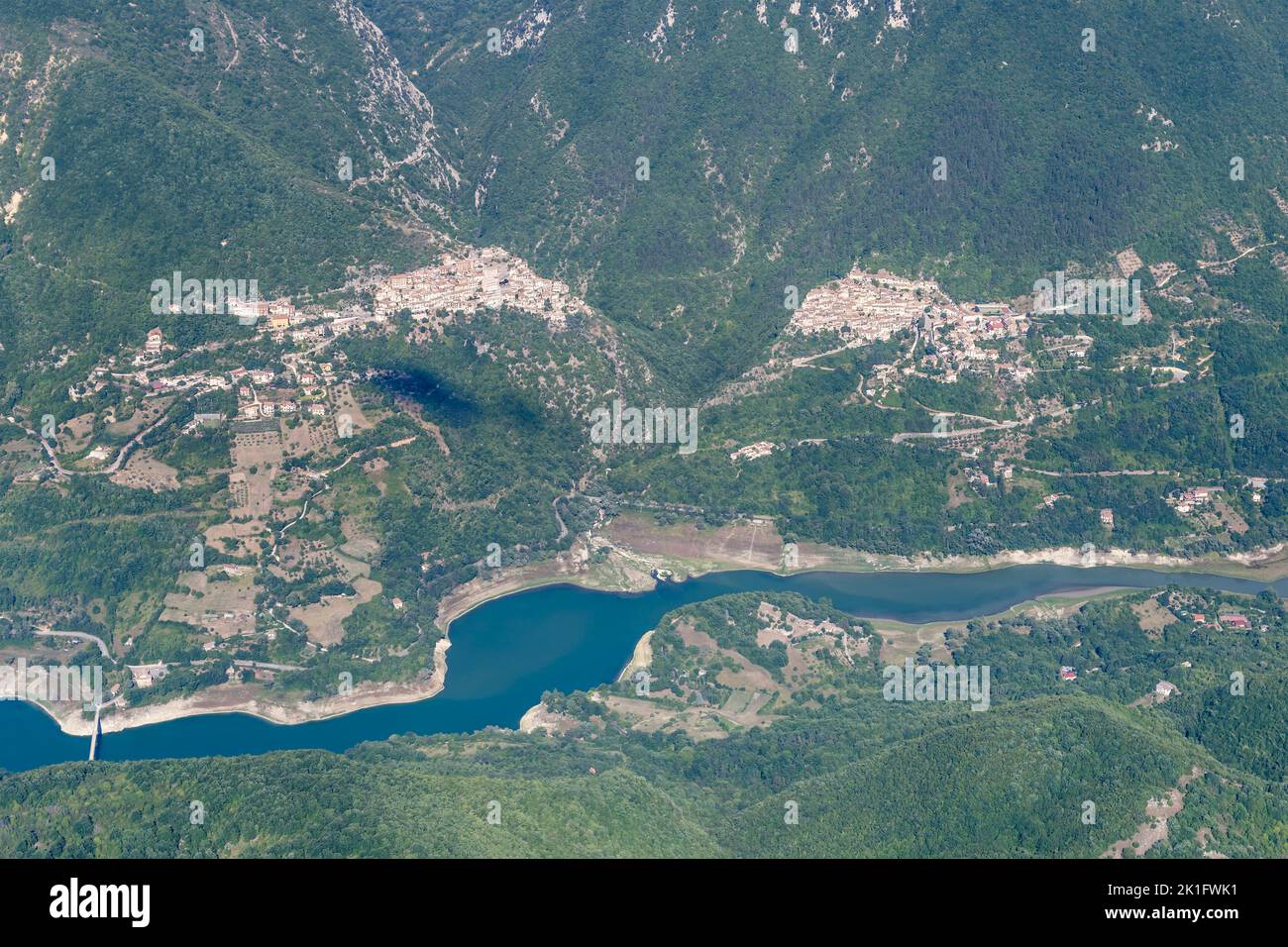 aerial shot, from a small plane, of Ascrea and Paganico Sabino hilltop ...