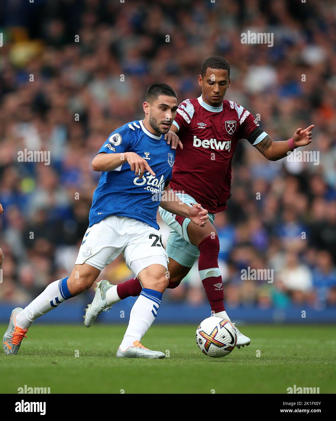 Everton’s Neal Maupay and West Ham United's Thilo Kehrer (right) battle ...