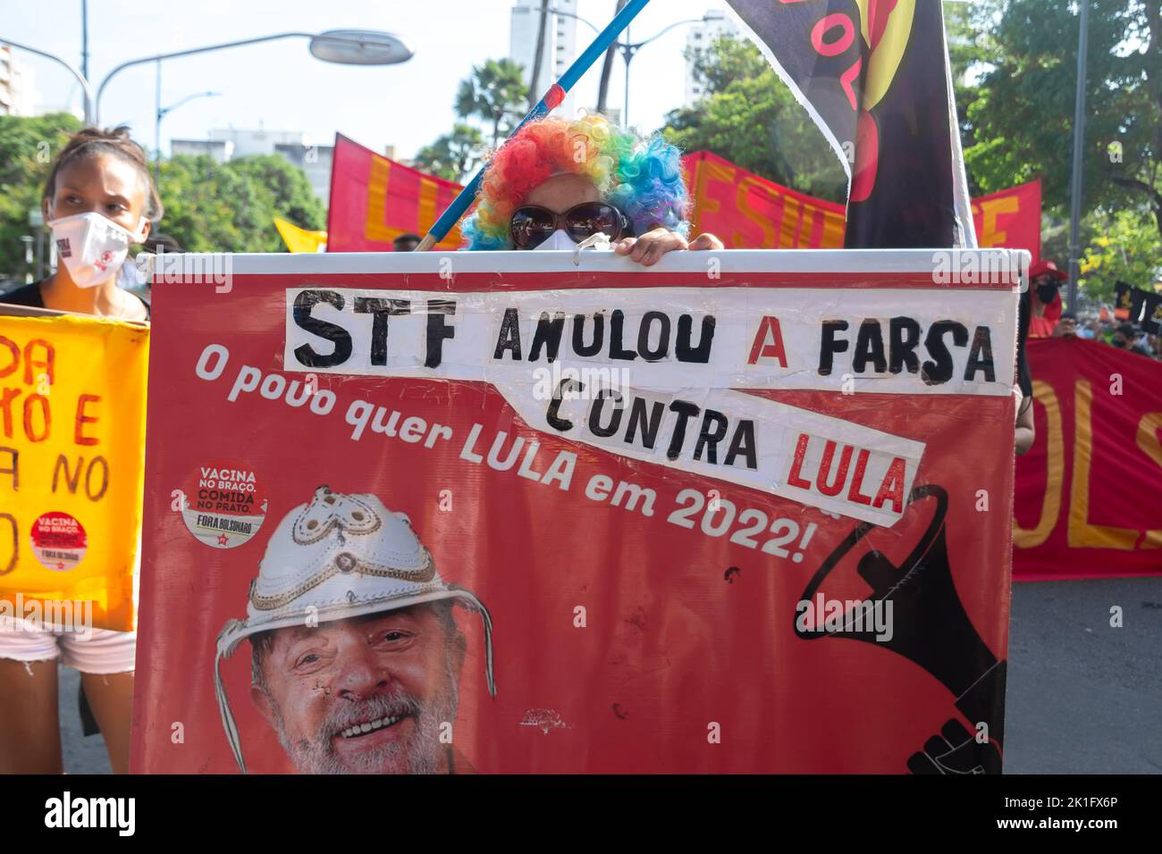 Brazilians protest carrying posters against the government of President ...