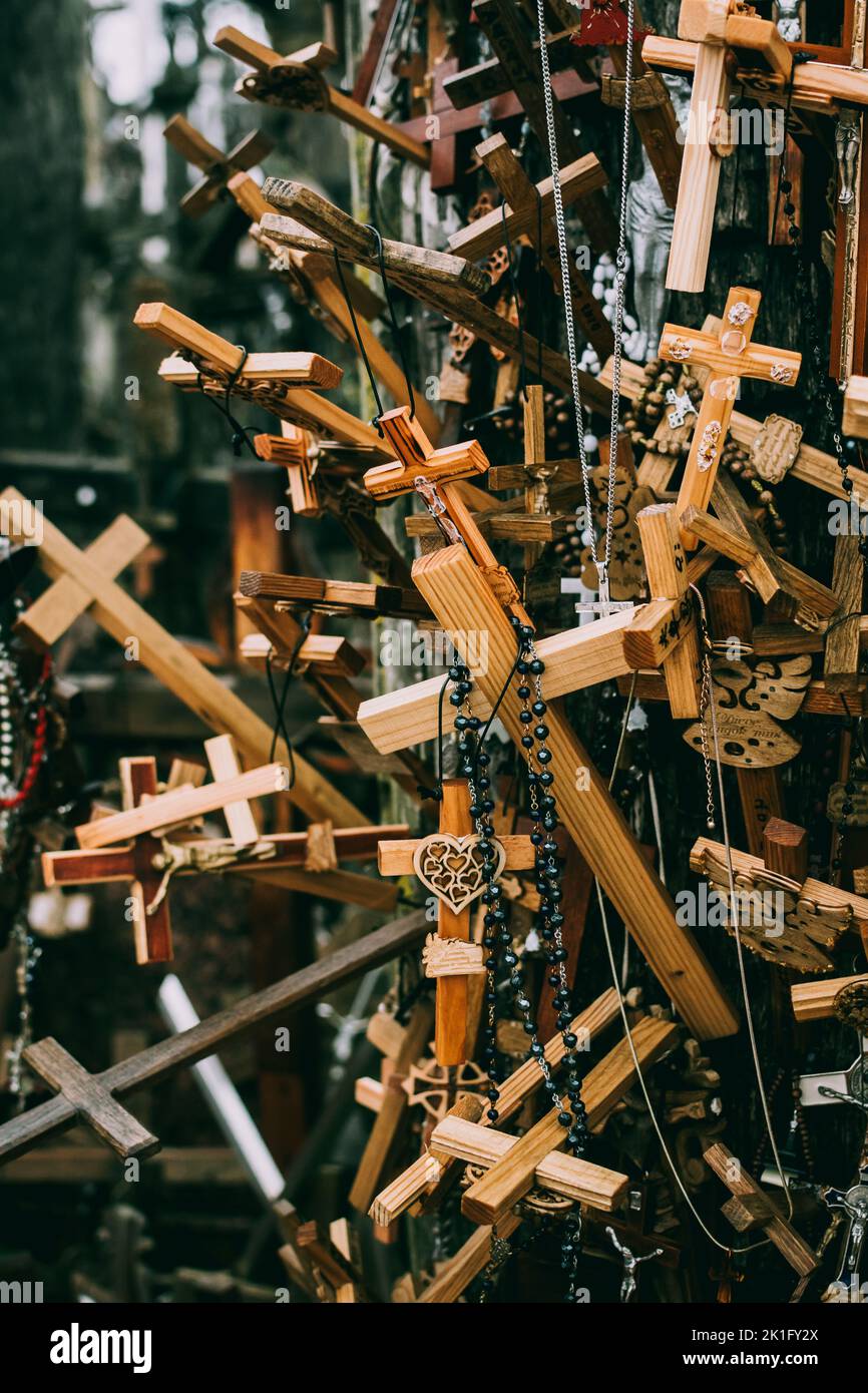 Wooden crosses hanging on the tree Stock Photo - Alamy