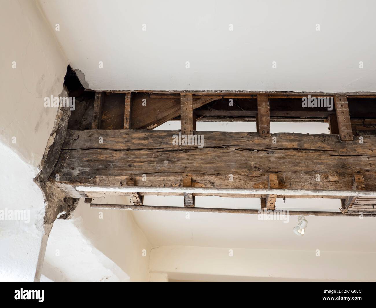An exposed 17th century oak beam in a house in Settle, Yorkshire Dales ...