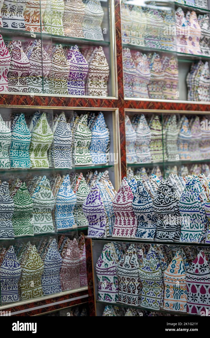 Windows full of kuma (traditional Omani hat) on sal,e Muttrah Souq ...
