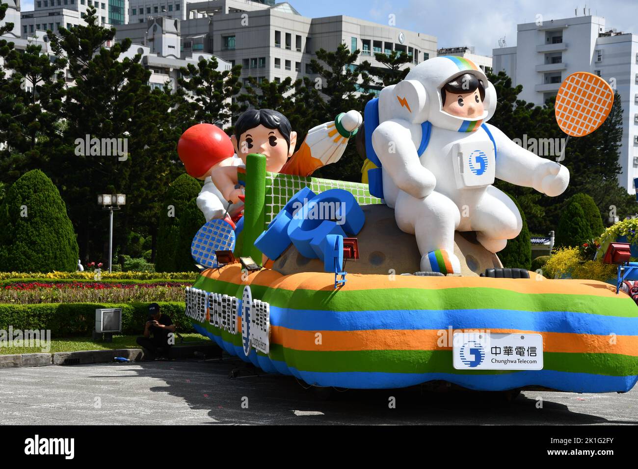 A parade float in the shape of an astronaut and spaceship in Taipei ...