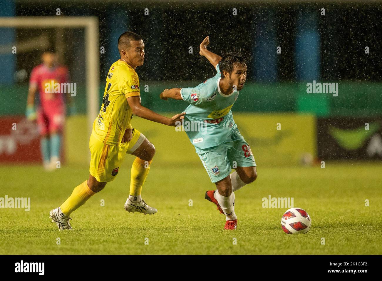 PATTAYA, THAILAND - SEPTEMBER 18: WARUT WONGDEE of Pattaya Dolphins United and NUTTAWUT ONIN of ...