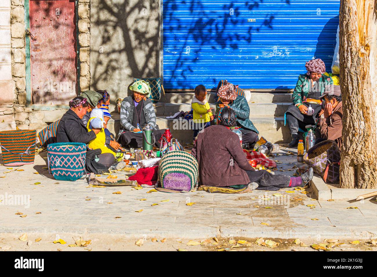 Family and Friends enjoying a meal outside the gate to the Pelkor Chode ...