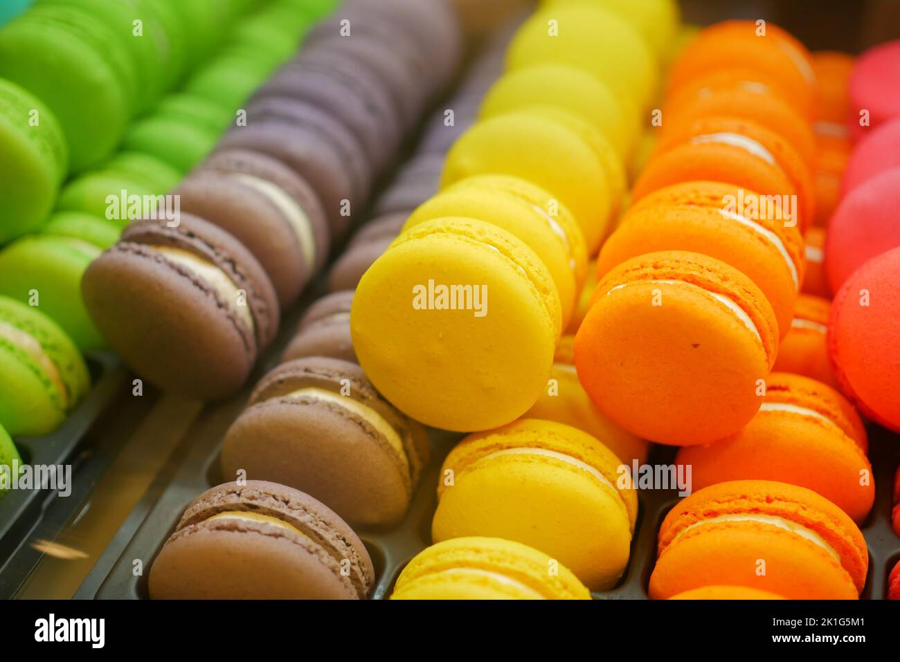 red, yellow , green color macaroon displaying Stock Photo - Alamy