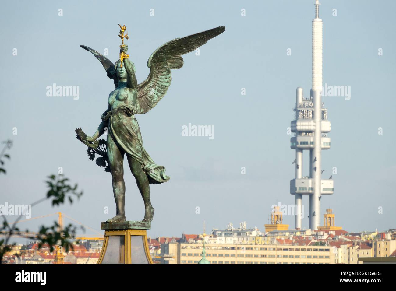 Prague Statue of Angel on top of a column on the Cechuv Most Bridge in ...