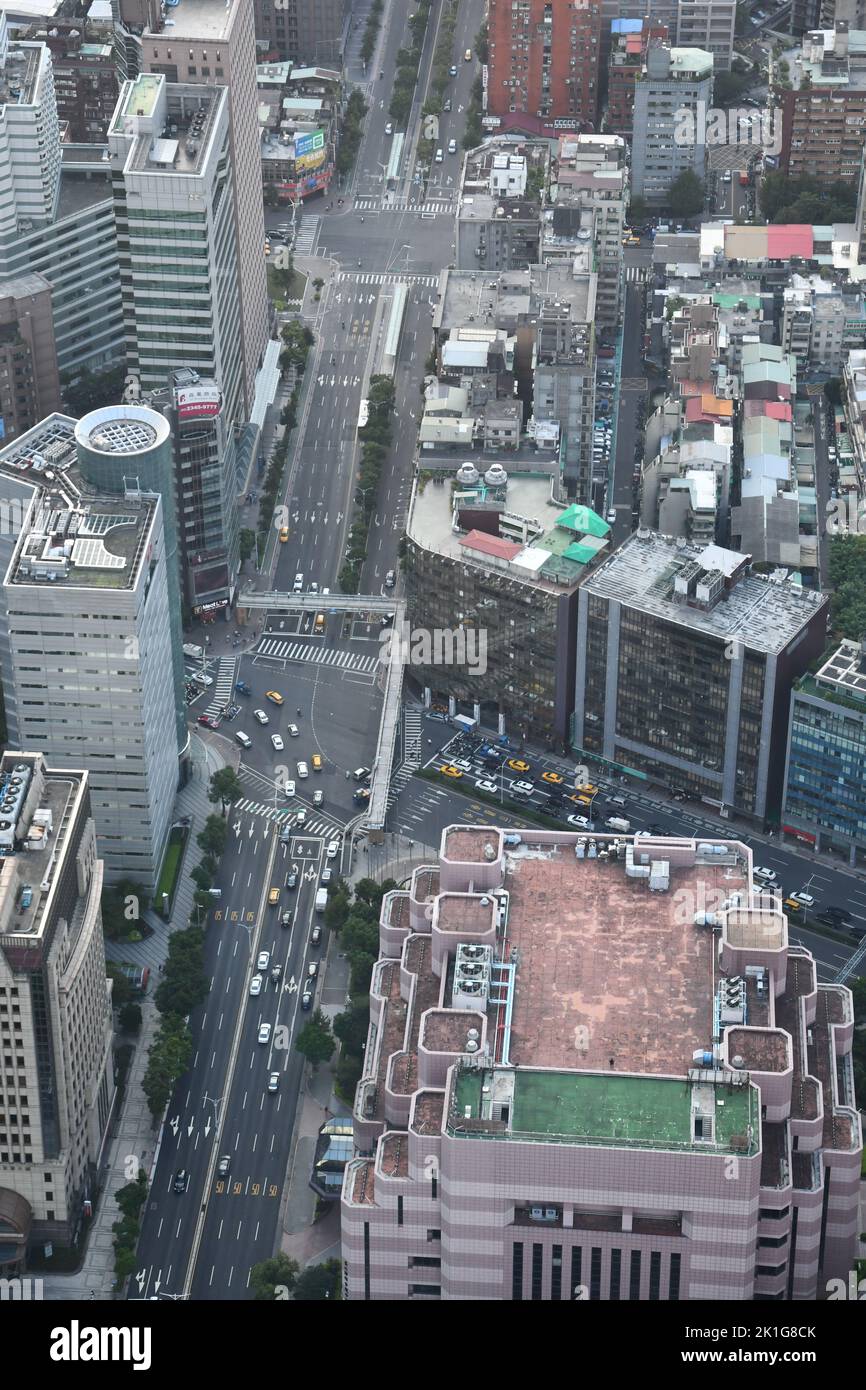 An aerial view of a cityscape with high buildings and streets with ...