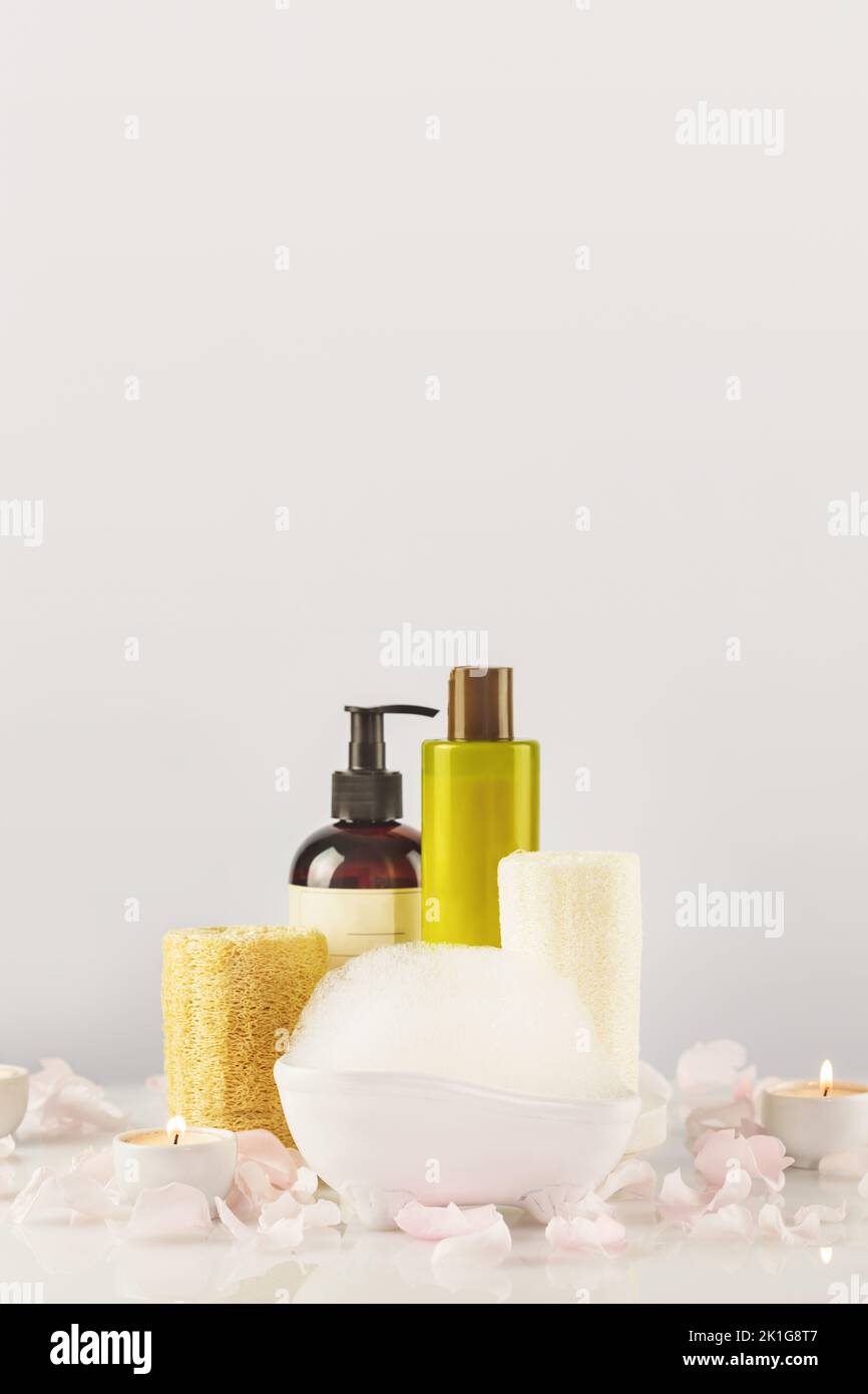 Spa relax composition with bath beauty products, cosmetics and candles ...