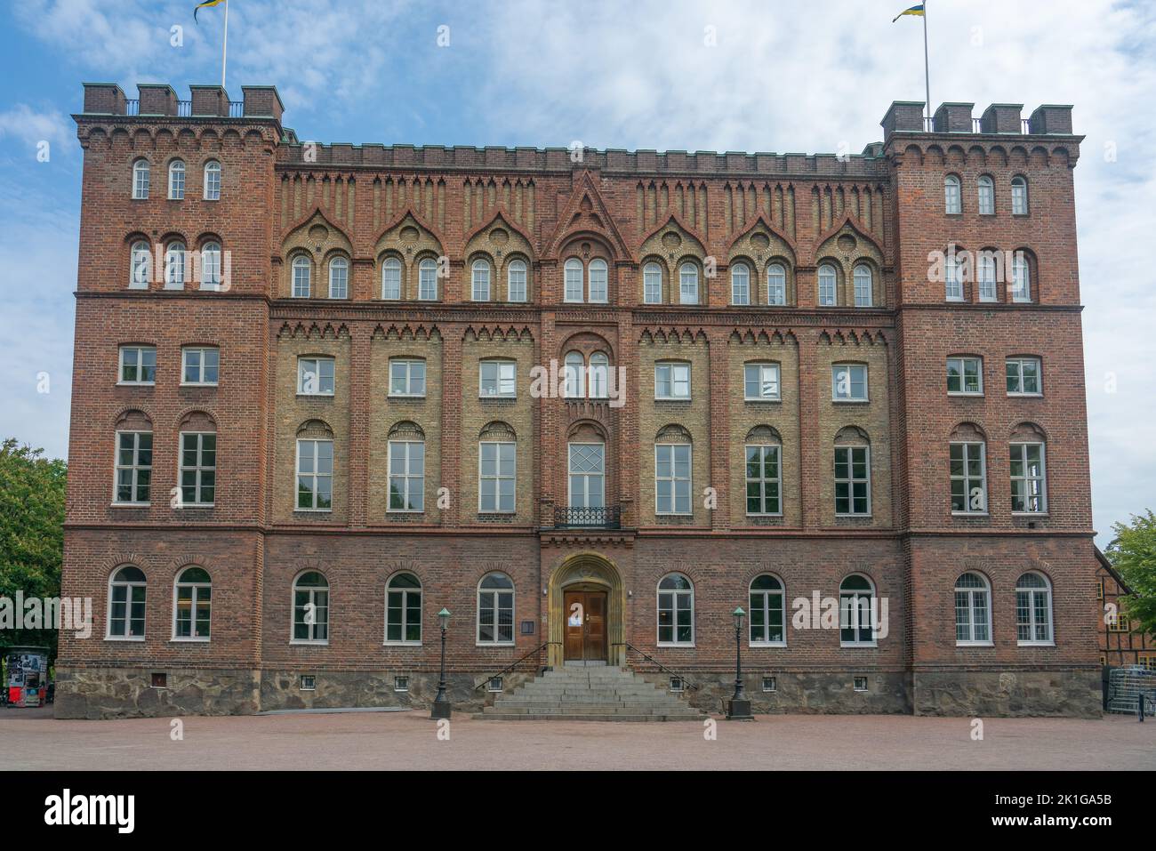 The facade view of the AF-Borgen building under a blue sky with white ...