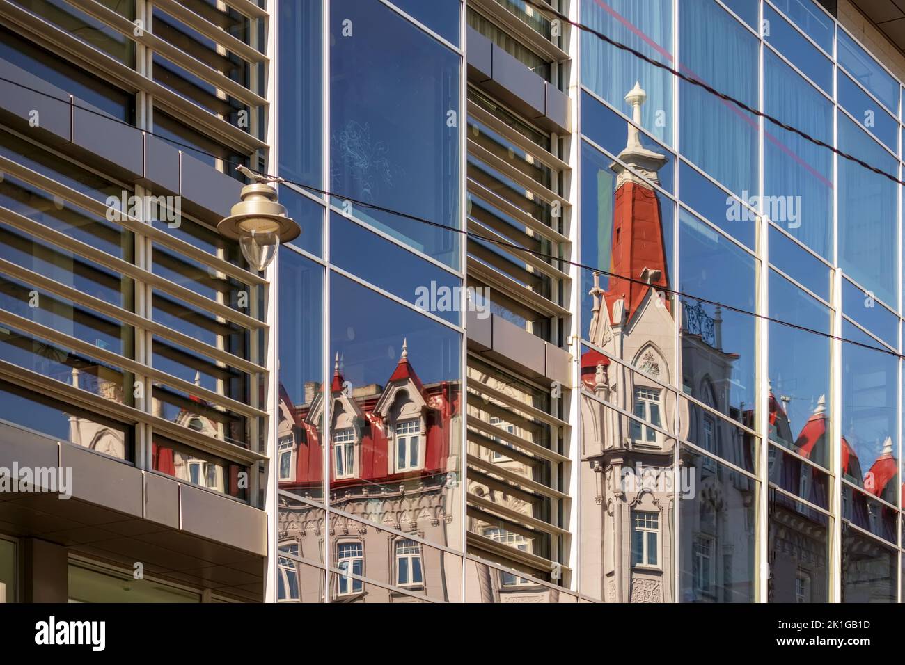 A transparent building in the middle of the city center with many ...