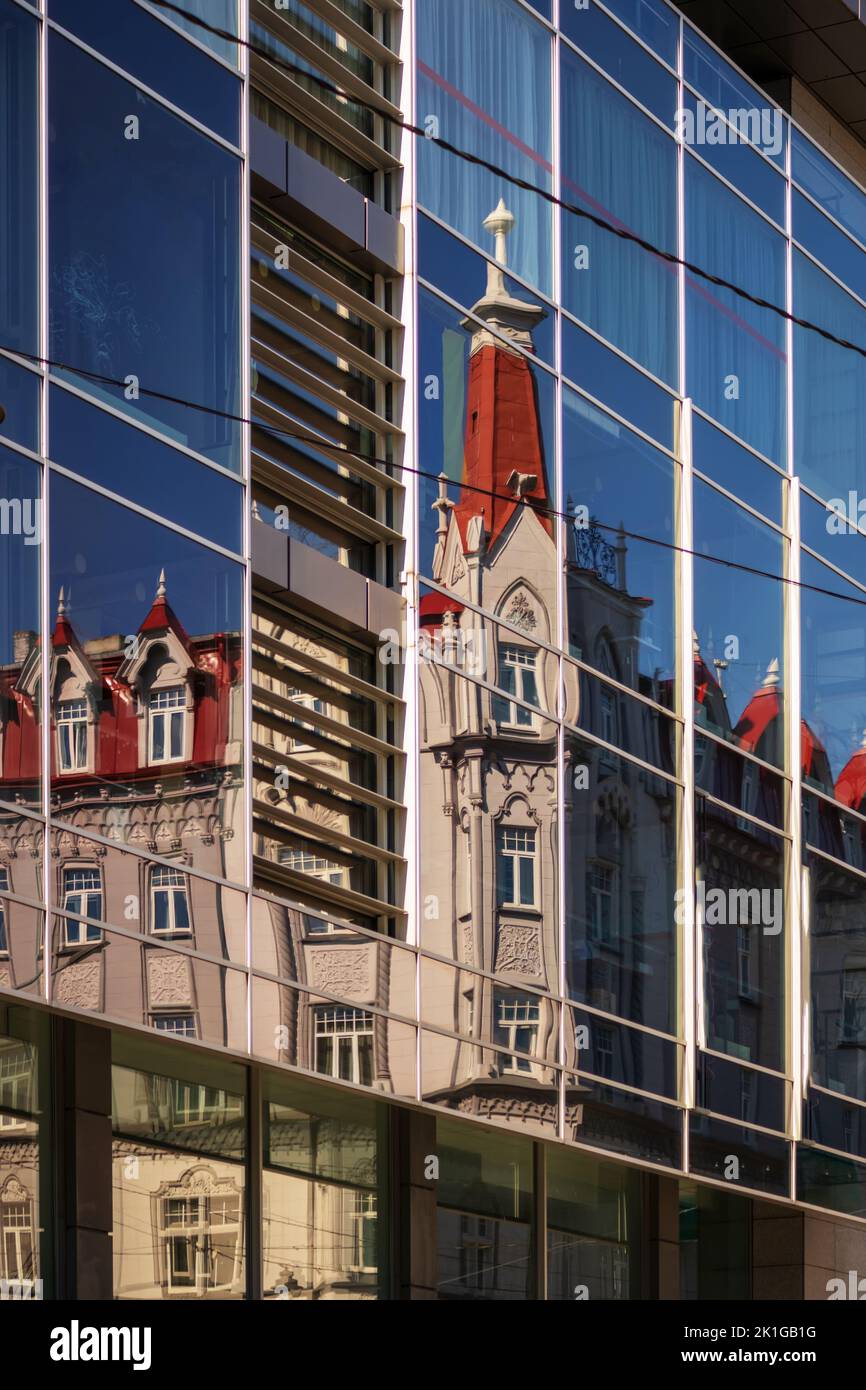 A transparent building in the middle of the city center with many ...