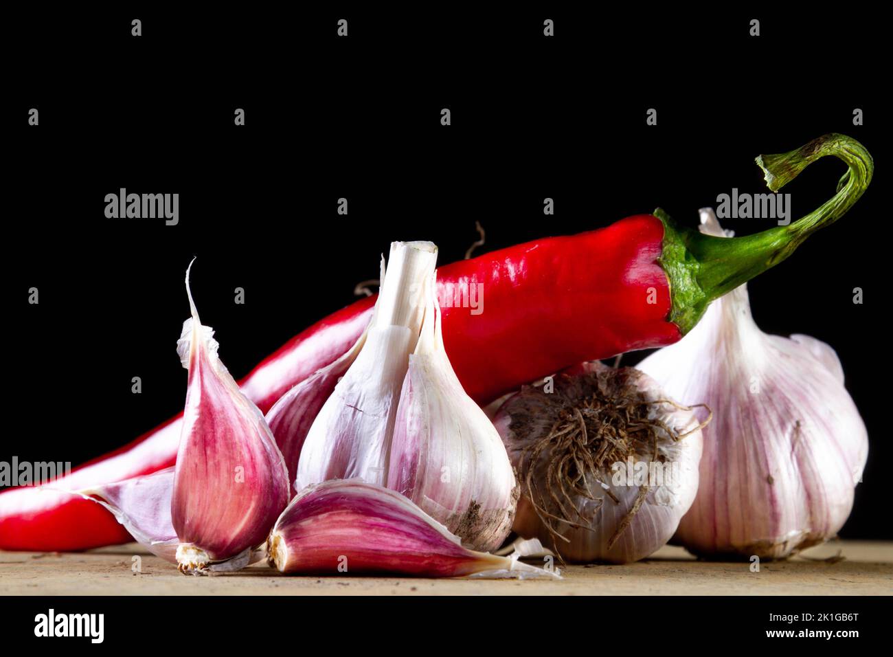 Garlic and pepper. Spicy spices. Hot red pepper. Natural spices Stock ...