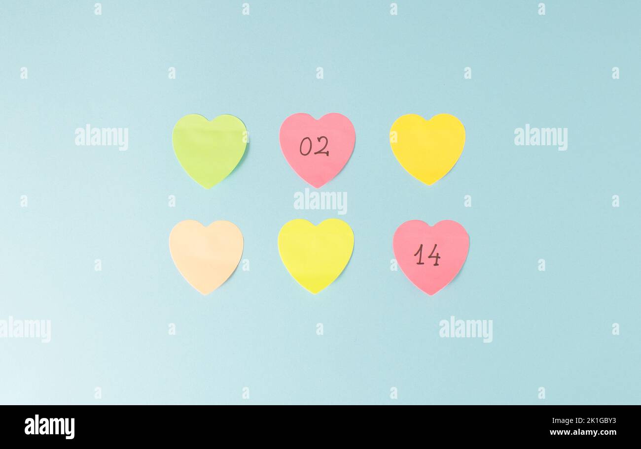 Valentine's Day post it notes reminder on a pale blue background ...