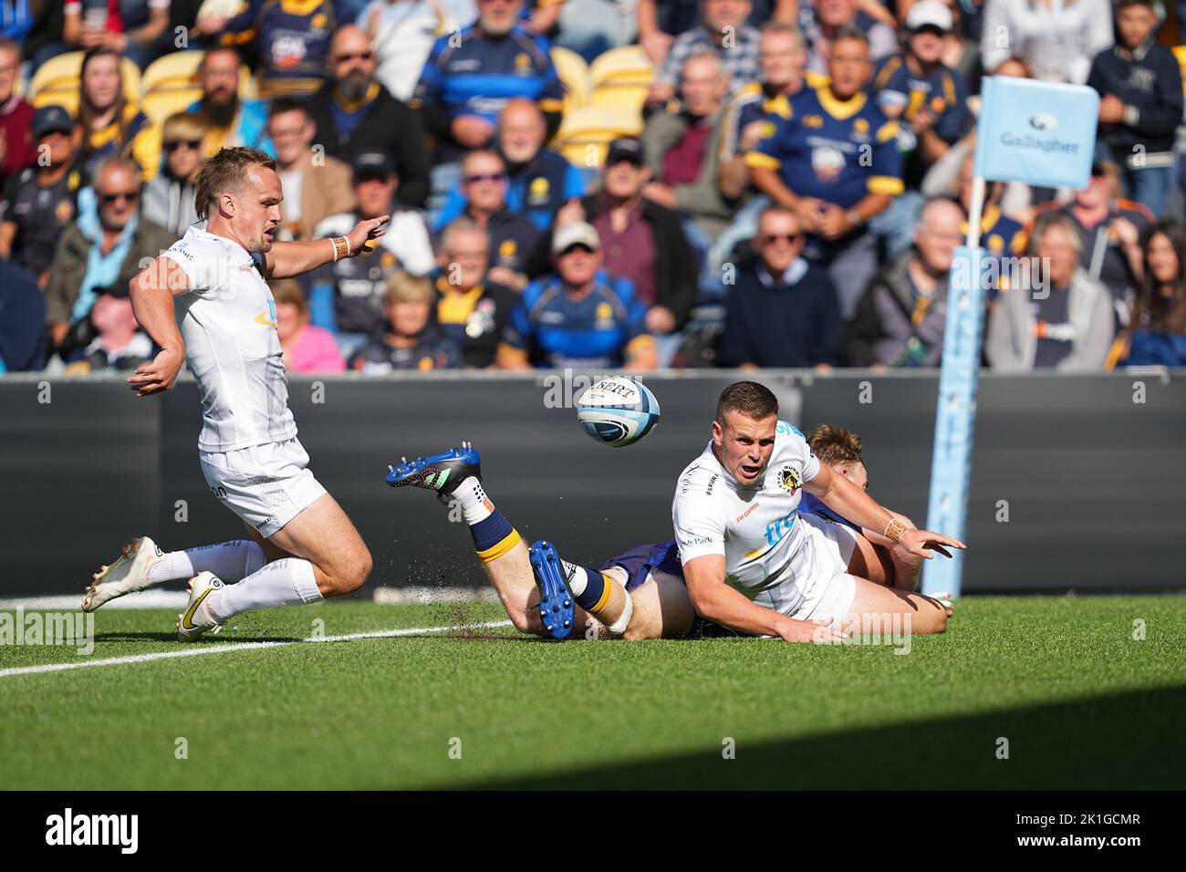 Joe Simmonds of Exeter Chiefs manages to stop Gareth Simpson of ...