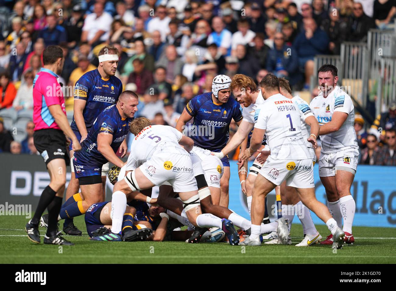 Worcester and Exeter players pile on after the first tackle of the ...