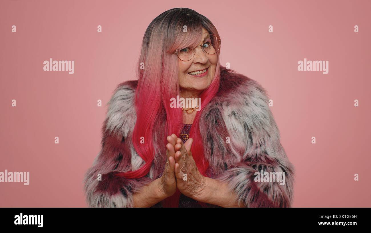 Sneaky cunning woman with tricky face gesticulating and scheming evil ...