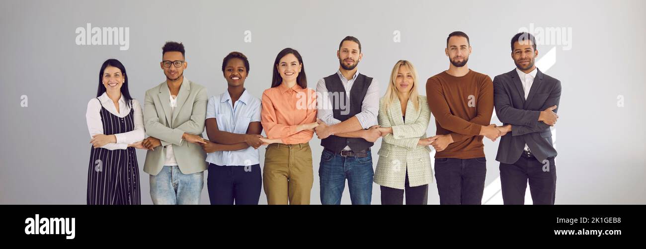 Portrait of successful group of business people standing together in ...