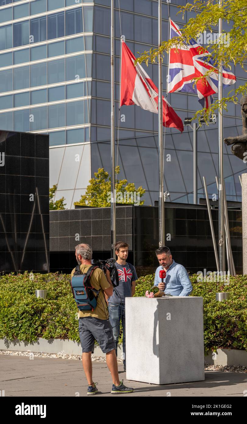 Flowers left after Union flag lowered afterRH the Queen death ...