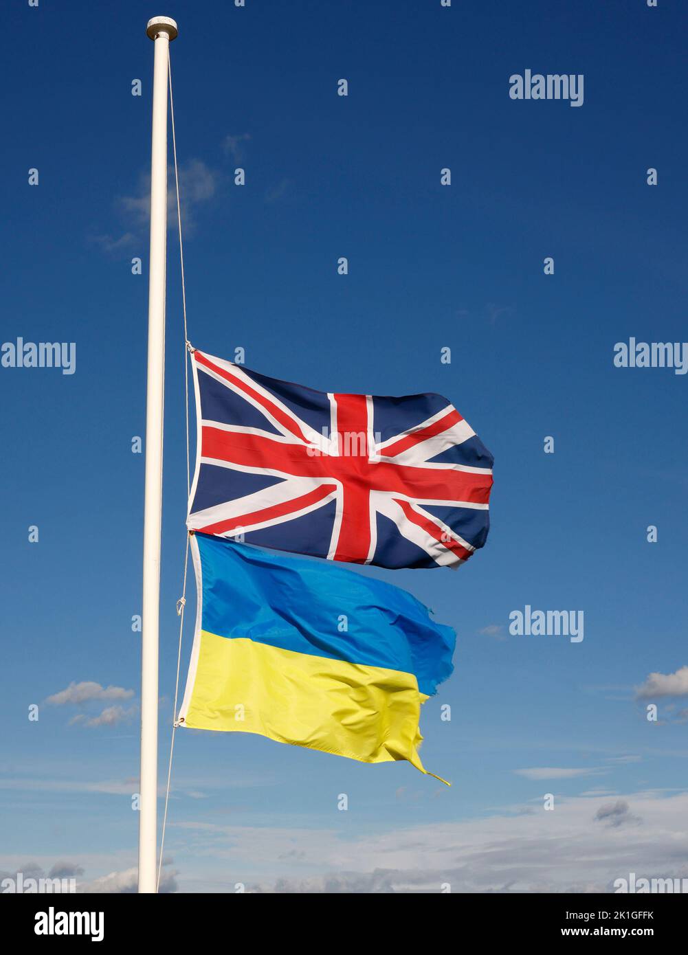 Close up of the national flags of the United Kingdom and the Ukraine ...