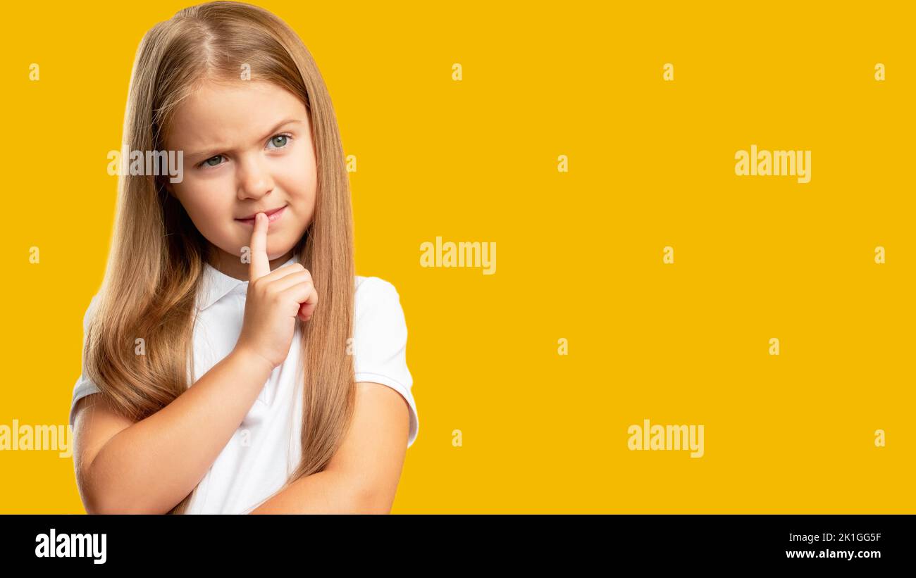 Curious child. Advertising background. Hard choice. Portrait of puzzled ...