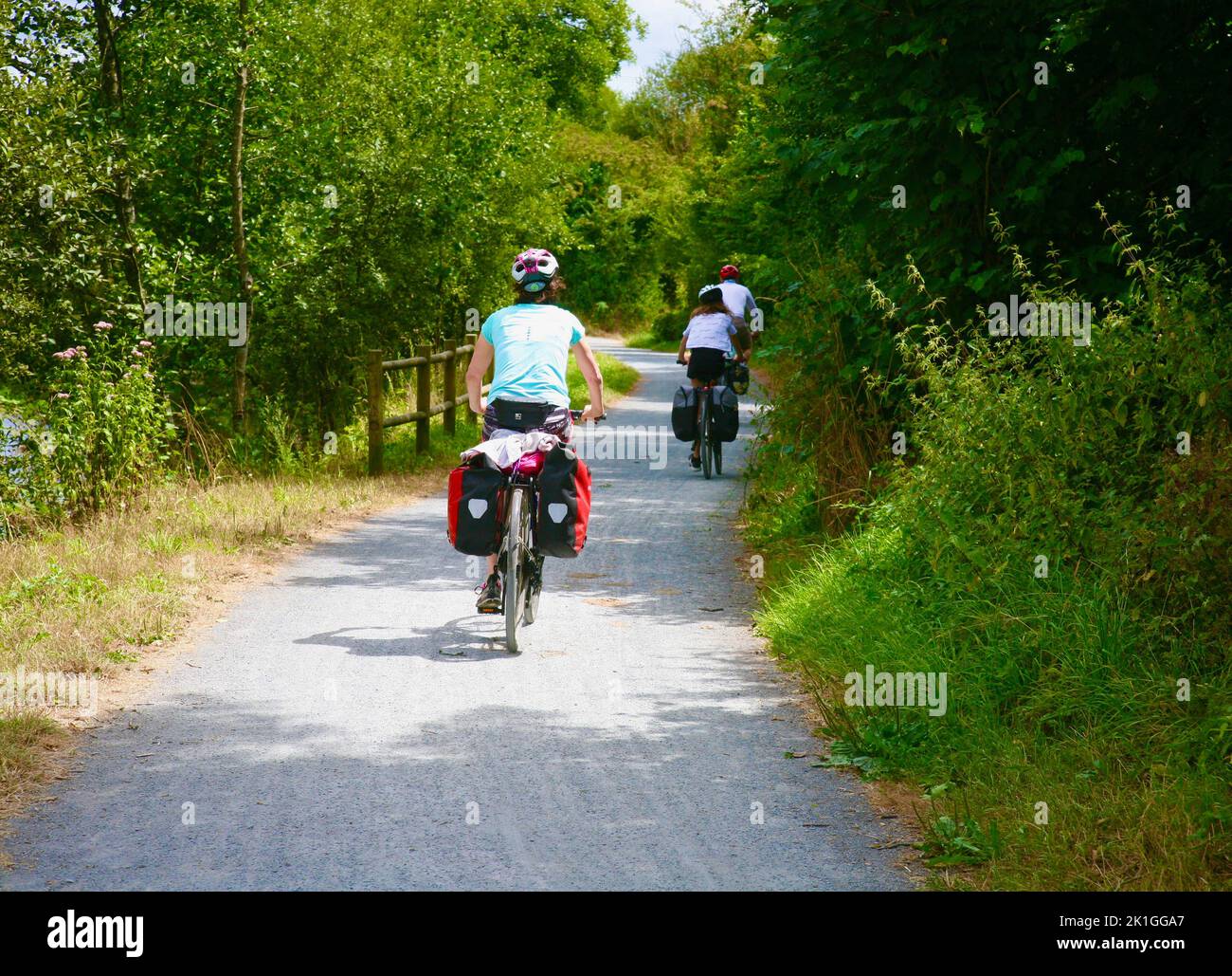 Cyclists on the towpath, River Vire, Saint-Lo, Normandy, France, Europe ...
